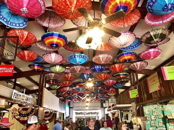 Look up and prepare to be dazzled by colorful umbrellas creating a whimsical canopy over shoppers hunting for their next great find.