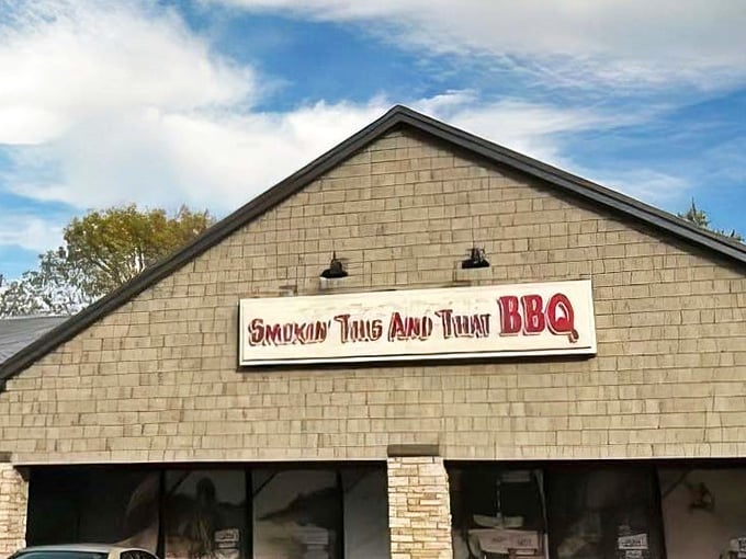 The unassuming exterior hides a treasure trove of smoked meats and military pride inside.