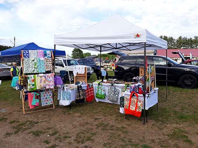 The outdoor vendors create a colorful marketplace where handmade treasures meet Michigan's fresh air and friendly faces.
