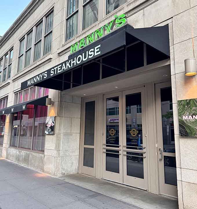 That green neon glow beckons like a beacon for carnivores navigating downtown Minneapolis's concrete jungle.