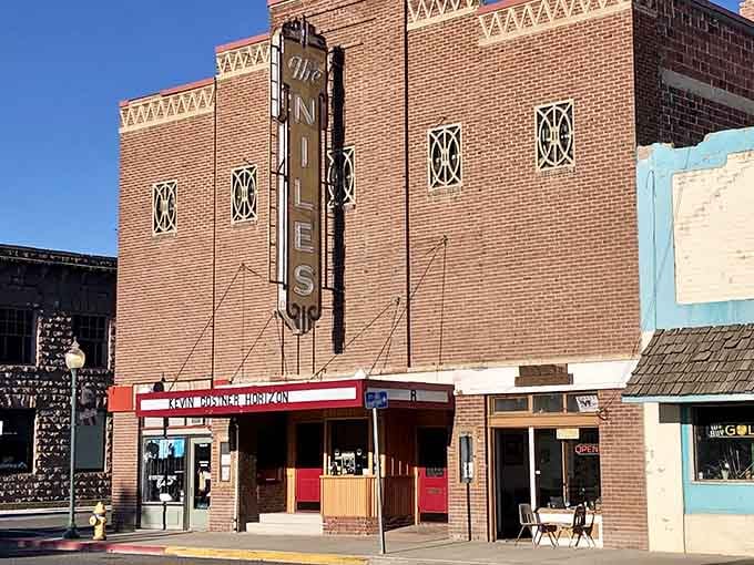 The Niles Theater stands proud on Main Street, a beautiful brick reminder that entertainment existed before Netflix ruined our attention spans.