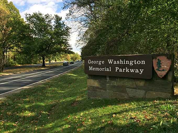 That National Park Service sign means you're about to drive through actual protected parkland, not just another highway.