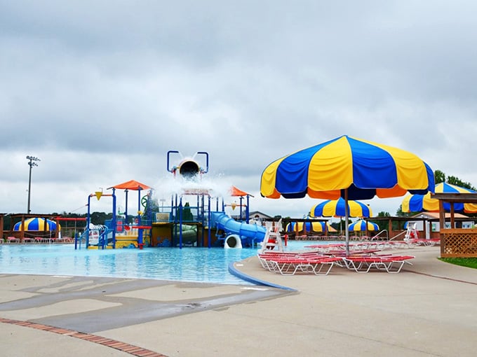 Those cheerful umbrellas promise shade while the slides promise thrills, a perfect summer combination for all ages.