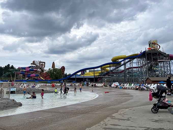 Those outdoor slides tower against dramatic skies, proving Mother Nature can't compete with year-round indoor fun.