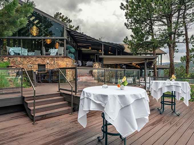 Stone, glass, and mountain views converge where architecture meets altitude in perfect Colorado harmony.