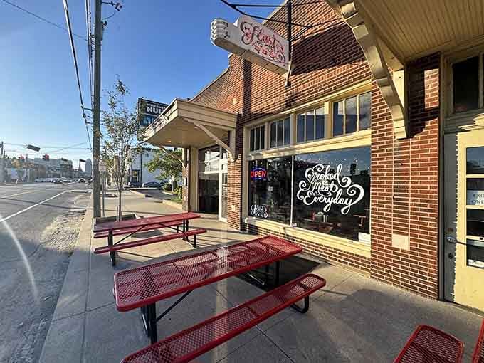 Red picnic tables out front mean serious business: this is a place where good food meets fresh air and nobody's pretending to be fancy.
