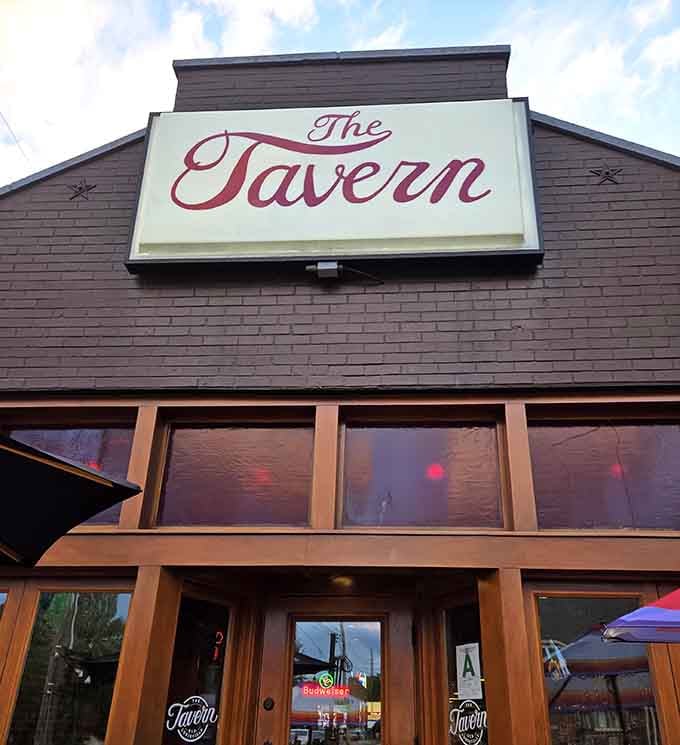 The classic tavern sign above those welcoming wooden doors promises exactly what's inside: honest, delicious food without the fuss.