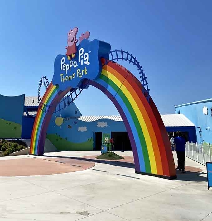 That rainbow archway isn't just an entrance, it's a portal to a world where cartoon physics apply.