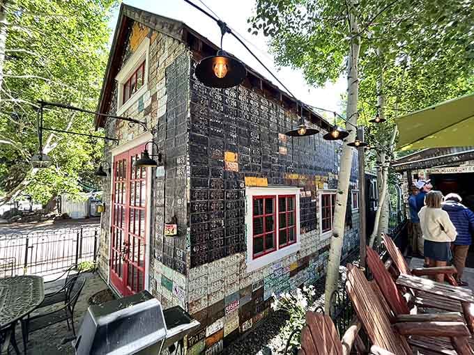 Red windows and license plate siding create the kind of quirky charm that makes Crested Butte absolutely irresistible.