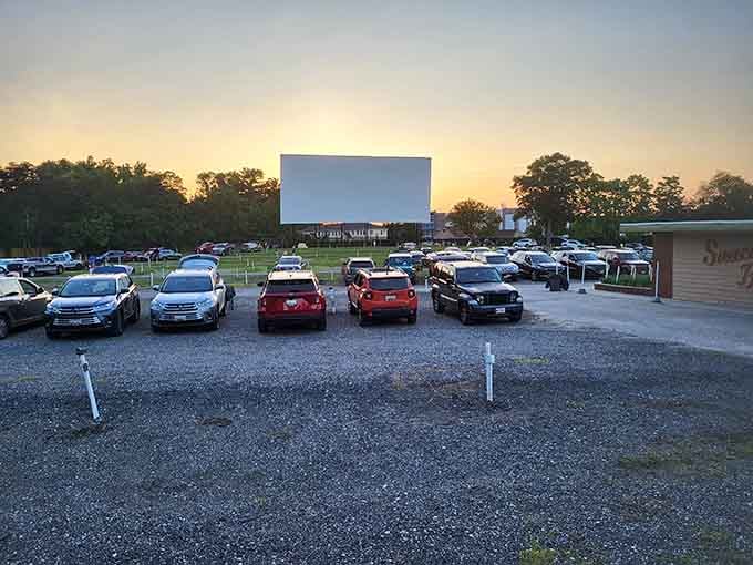 That massive screen rising against the sunset sky is your portal to movie magic, Maryland style.