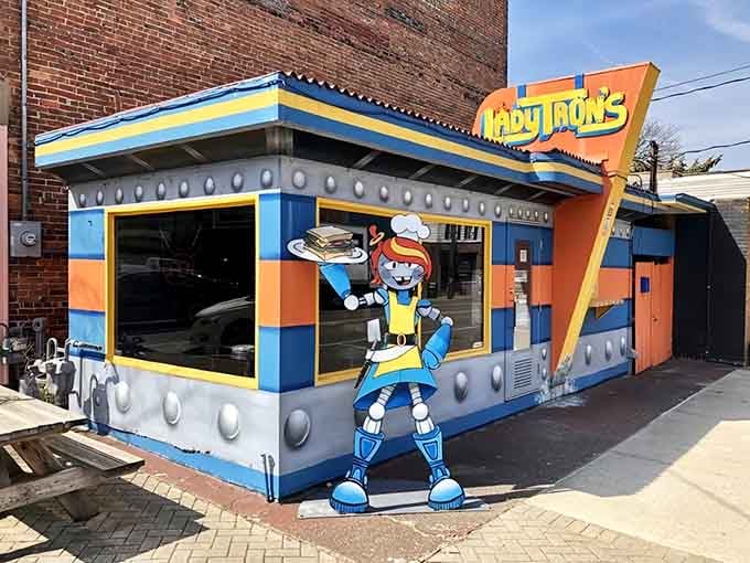 That robot mascot isn't just standing guard &ndash; it's practically begging you to come inside for lunch.