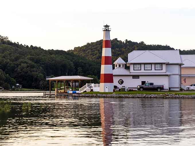 That charming red-and-white lighthouse isn't just decorative; it's basically the town's way of saying "welcome to paradise, watch for boats."