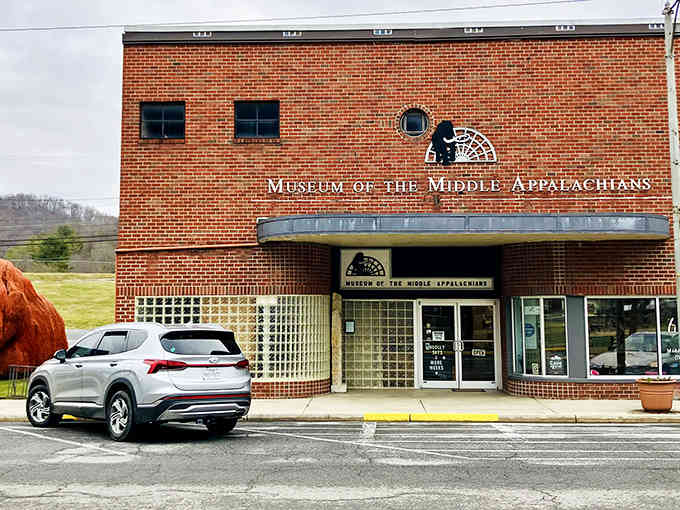 That classic brick facade hides a treasure trove of prehistoric wonders waiting just beyond those welcoming doors.