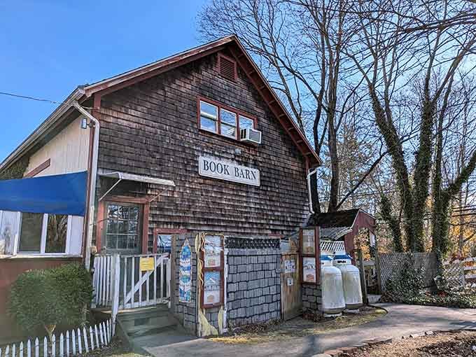 That weathered shingle siding has seen more book lovers than a library card catalog from 1952.