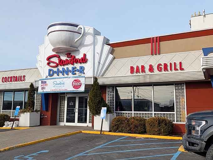 That giant coffee cup isn't just for show, it's a beacon calling hungry souls to breakfast salvation.