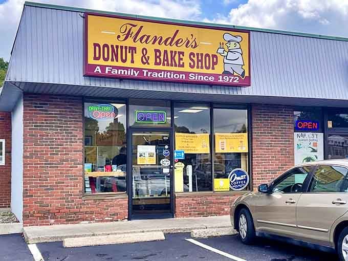 That cheerful chef logo has been welcoming donut lovers for decades, promising sweet happiness inside.