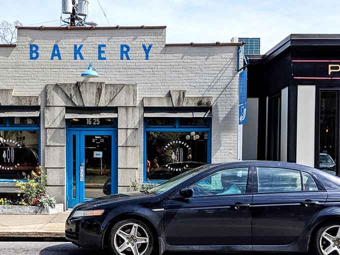 That bright blue "BAKERY" sign isn't just decoration; it's a beacon calling carb lovers home to happiness.
