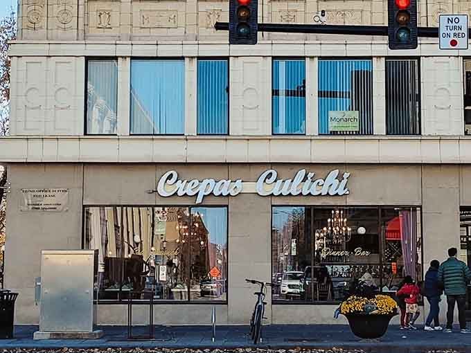 That cursive signage against classic architecture is calling your name louder than your alarm clock on Sunday morning.