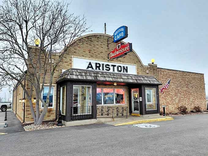 That brick facade and vintage signage practically scream "authentic Route 66," louder than your GPS recalculating for the third time.