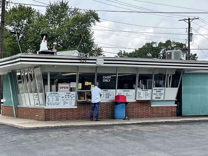 That giant chicken wearing a top hat isn't just whimsical, it's a beacon calling you to fried chicken paradise.