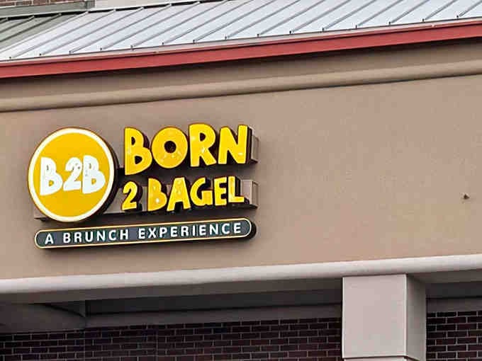 When a place puts "A Brunch Experience" right on the sign, you know they're not messing around with mediocrity.