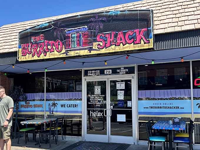 That neon sign isn't whispering, it's announcing loud and proud that serious burrito business happens here daily.