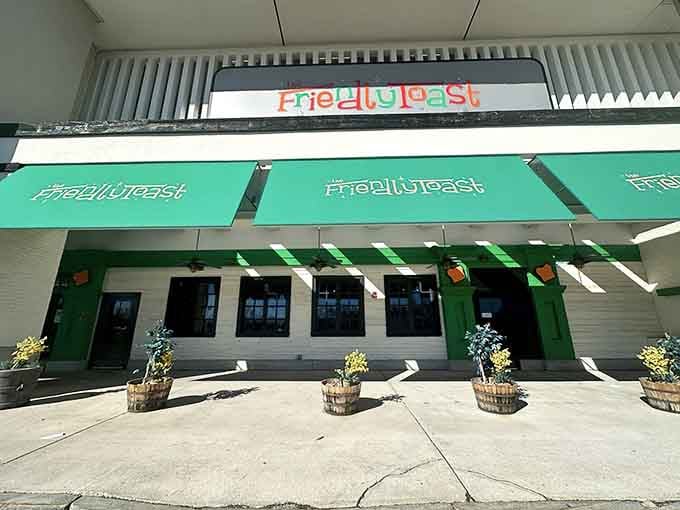 The vibrant exterior promises exactly what's inside: colorful food, colorful vibes, and zero pretension whatsoever.