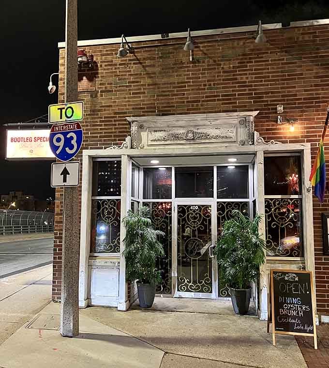 Evening glow makes this vintage storefront even more inviting, like a secret club where everyone's welcome.