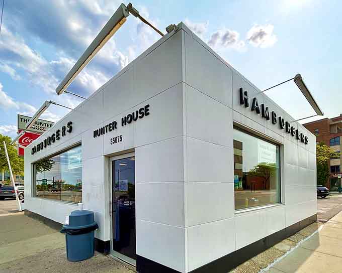 That gleaming white exterior isn't trying to impress anyone, just quietly serving burger perfection since forever.