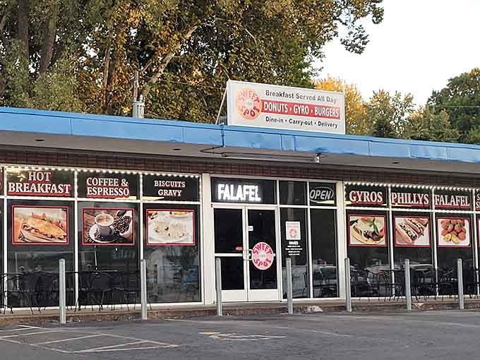 That unassuming strip mall exterior is hiding some serious breakfast magic behind those windows and doors.