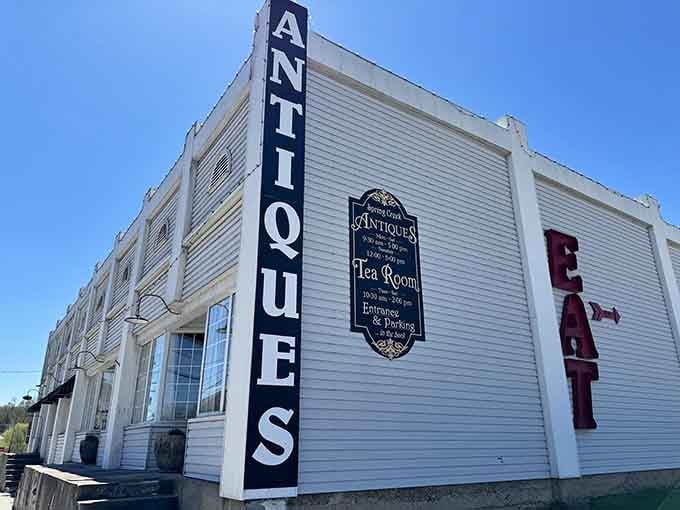 That vintage "ANTIQUES" sign isn't lying - this charming building houses treasures both edible and decorative in downtown Ozark.