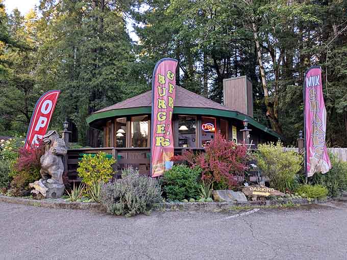 Colorful burger and milkshake banners announce what awaits inside&mdash;because subtlety is overrated when you're serving excellence among ancient redwoods.