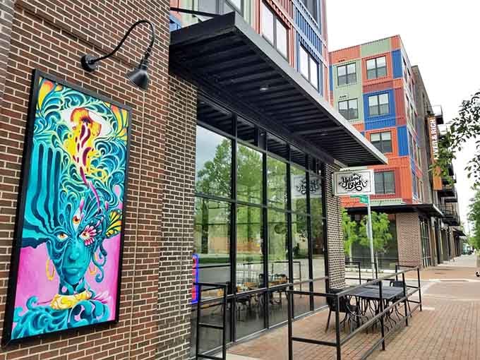 That vibrant mural isn't just street art, it's a neon invitation to cheese curd paradise in Columbus.