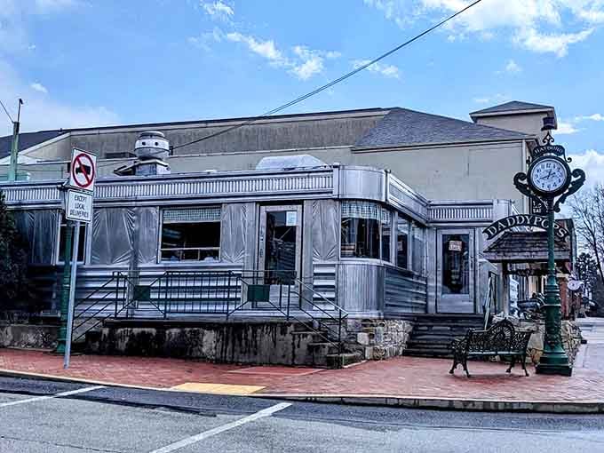 That gleaming aluminum exterior catches sunlight like a chrome-plated time machine parked on Main Street America.