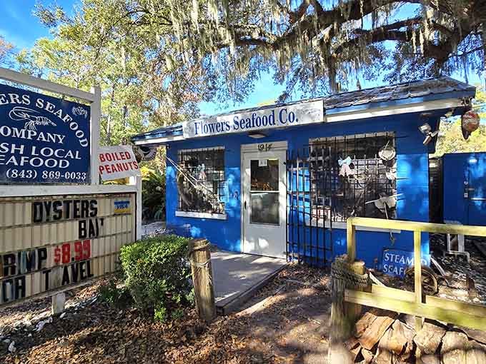 That blue building with the giant crab isn't just photogenic, it's your gateway to seafood heaven under the oaks.