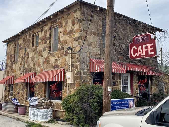 That weathered stone and those candy-striped awnings whisper stories older than your favorite pair of jeans.