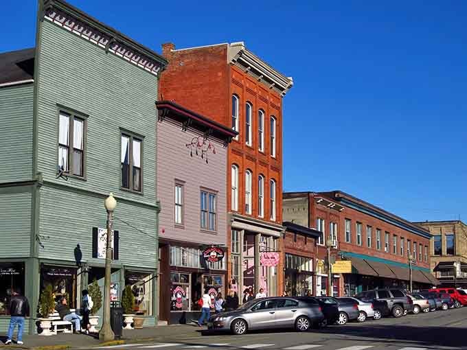 Historic buildings line streets where every window promises treasures your grandmother would have recognized and coveted immediately.