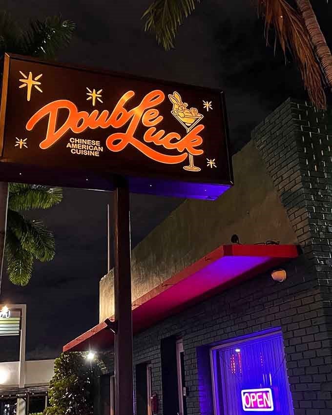 That retro-futuristic sign glowing against the Miami night sky is your beacon to Chinese-American fusion paradise.