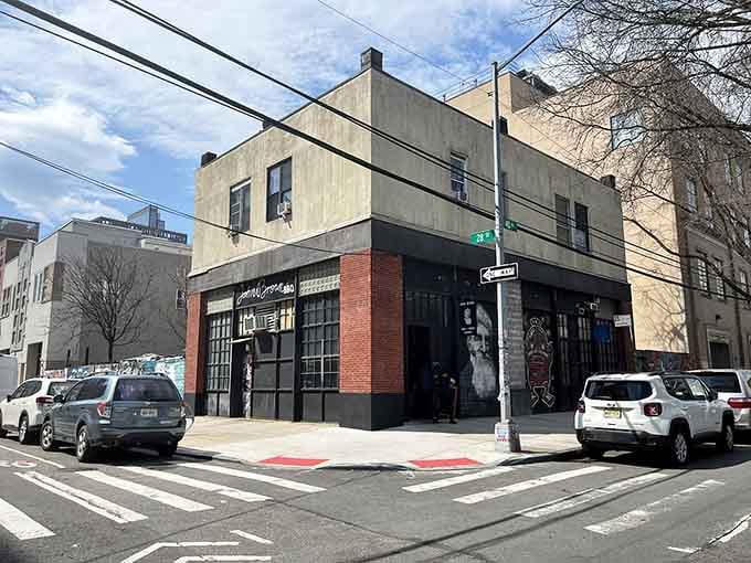 That industrial-chic corner spot promises serious barbecue, and the aroma drifting outside confirms it beautifully.