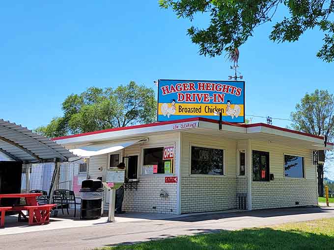 That classic drive-in architecture hits different when you know legendary broasted chicken awaits inside those walls.