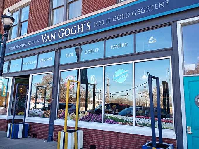 That bright blue facade isn't just pretty, it's practically waving you inside for Dutch deliciousness.