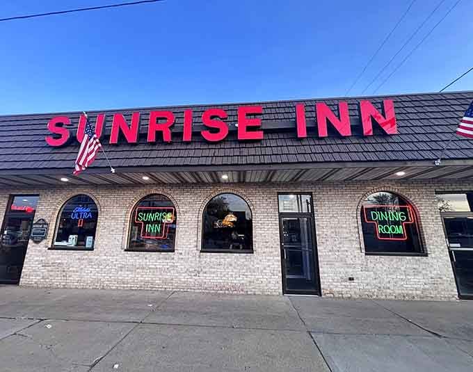 That bright red sign isn't just calling you in, it's practically demanding you experience pizza perfection.