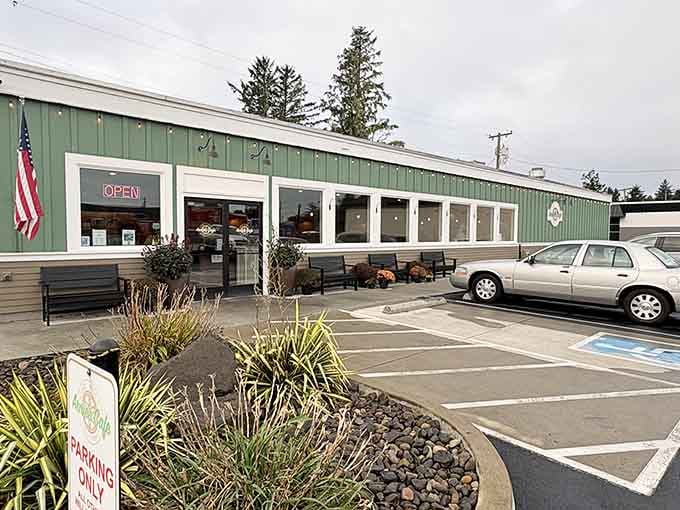 Benches outside for waiting, American flag flying proud, and a parking lot ready for your breakfast pilgrimage.