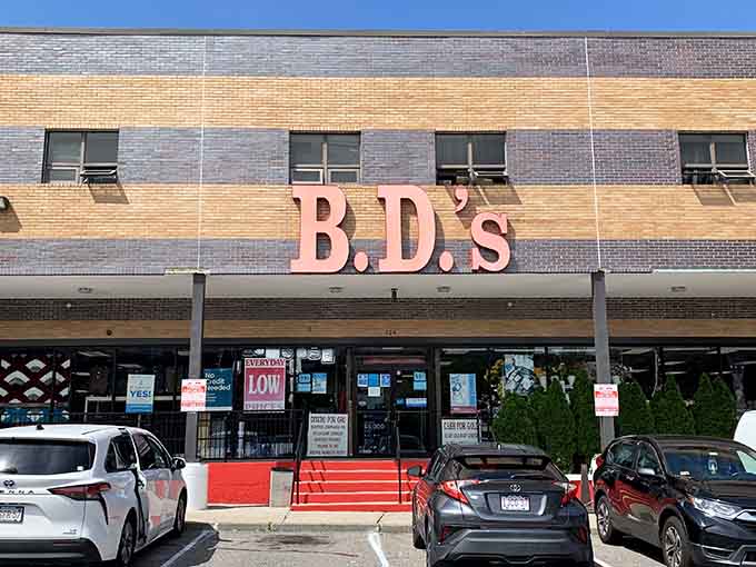 That bold pink signage isn't whispering, it's announcing deals loud enough for your wallet to hear blocks away.