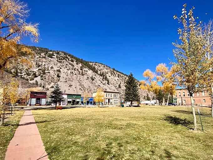 Historic storefronts stand shoulder to shoulder beneath mountains that have seen generations come and go seeking silver and solitude.