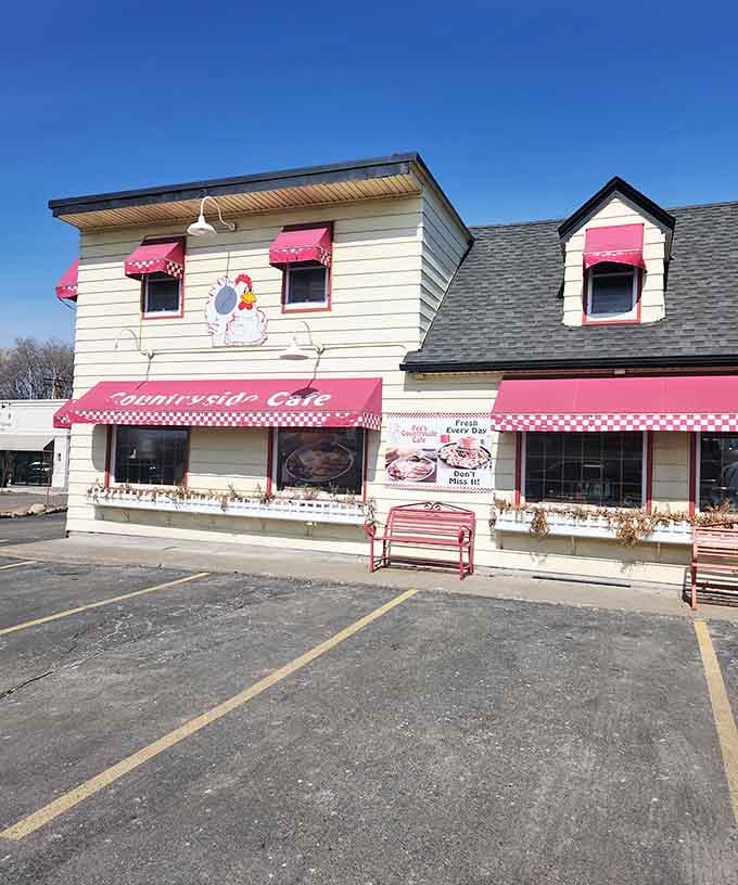 The red-and-white checkered awnings practically wave you in like a friendly neighbor inviting you over for breakfast.