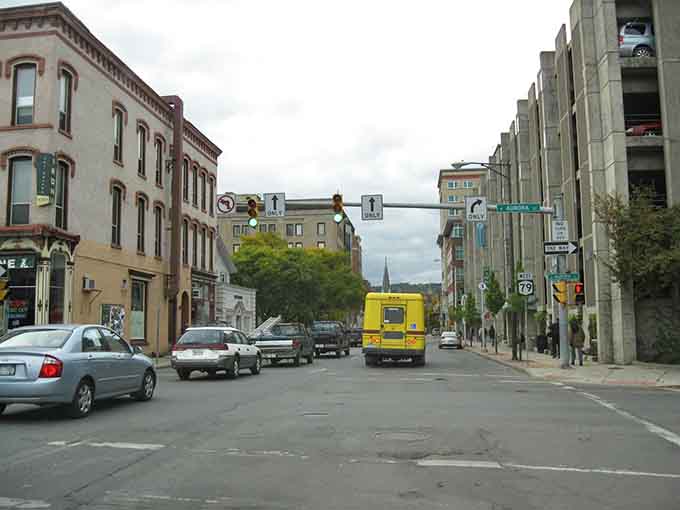 Downtown Ithaca stretches out with that perfect small-city charm where church spires still define the skyline.