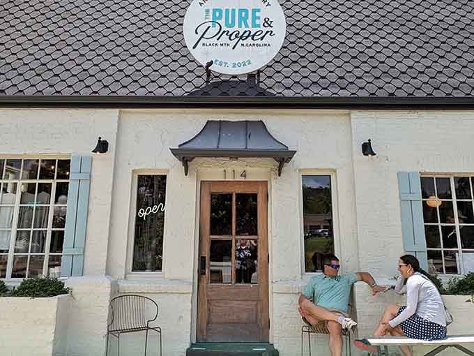 The Pure & Proper's entrance welcomes you with classic architectural details that whisper stories from decades past.