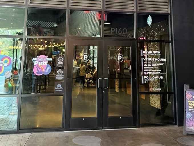 Floor-to-ceiling windows reveal the magic inside, where neon courses and craft drinks conspire to make you forget it's a weeknight.