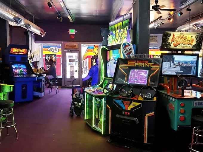 Step inside and let the neon glow wash over you like a digital baptism into gaming paradise.